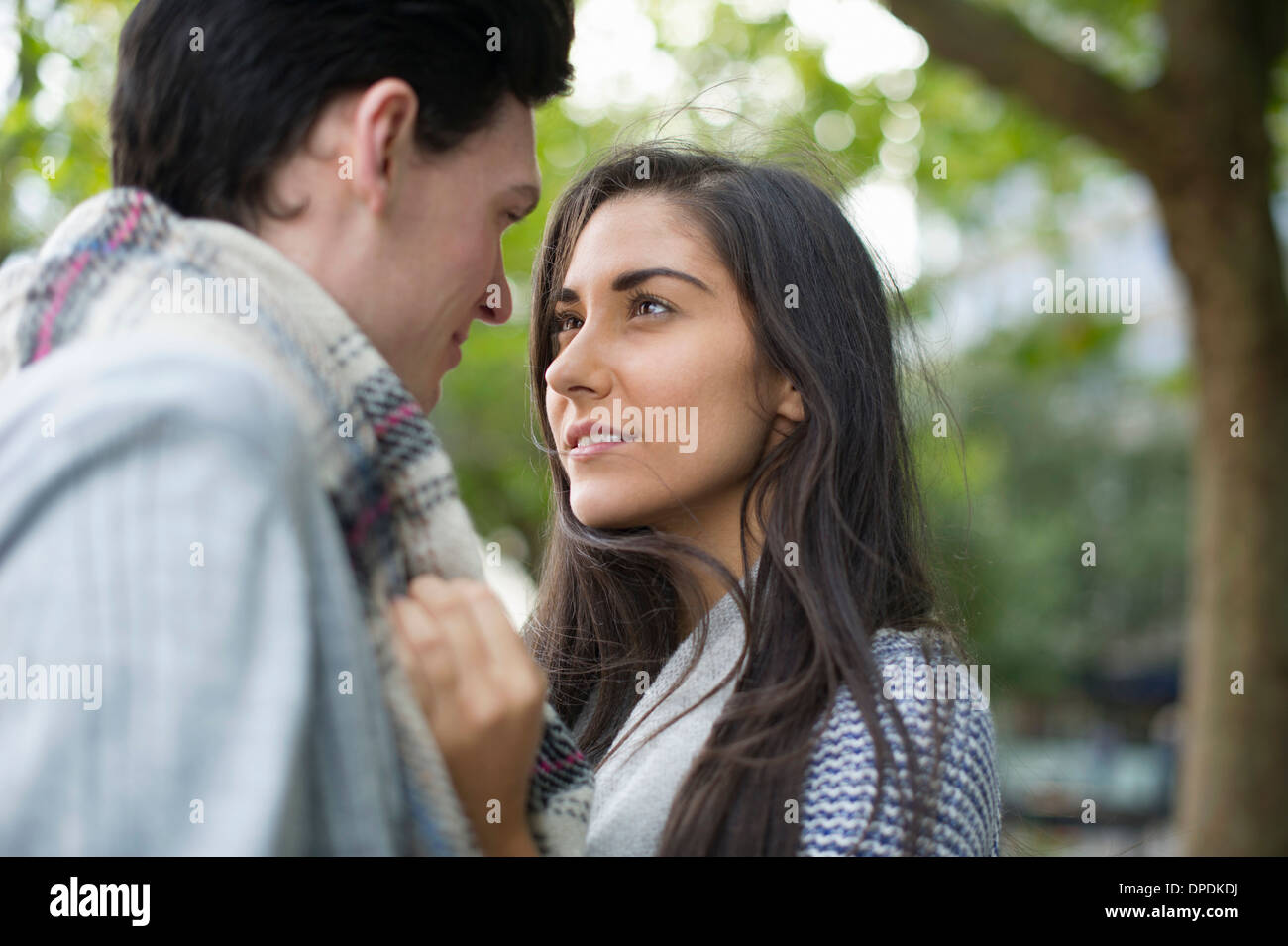 Young couple face to face Stock Photo - Alamy