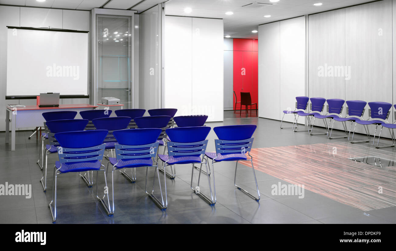 Blue chairs in conference room Stock Photo - Alamy