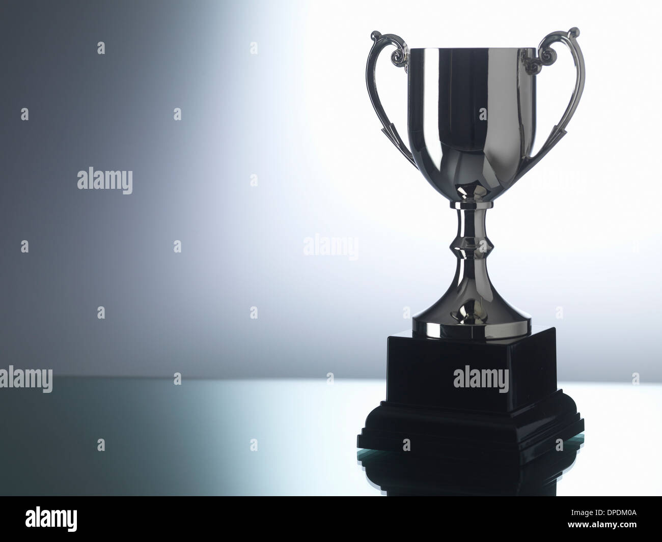 Trophy against black and white background Stock Photo - Alamy