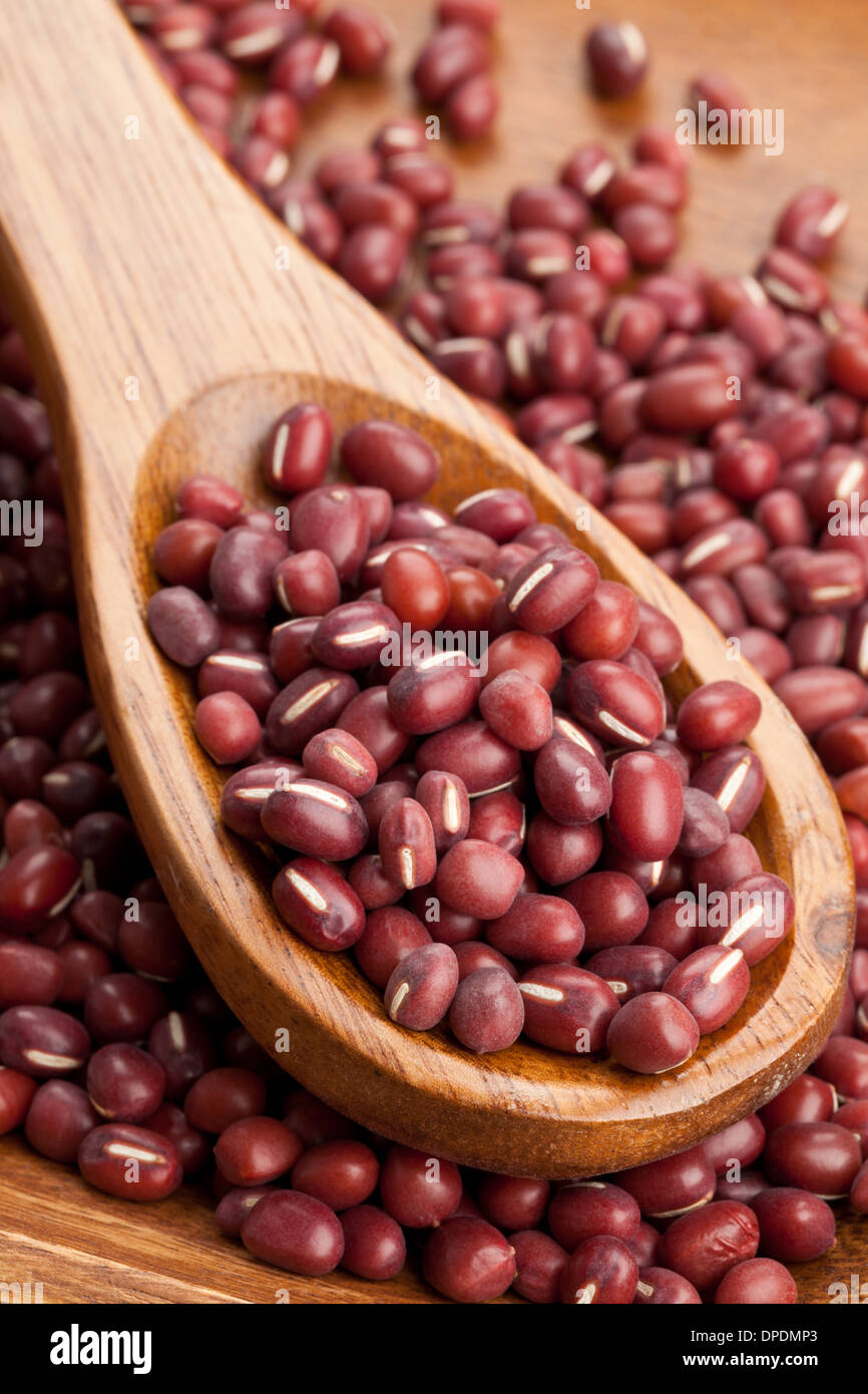 Raw azuki beans on wooden spoon Stock Photo - Alamy