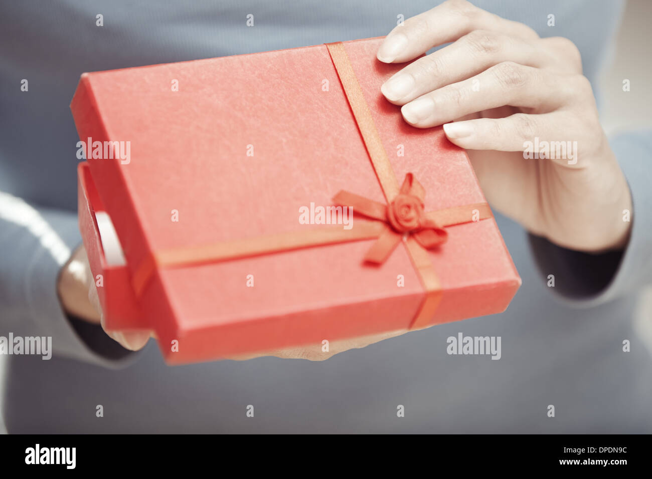 Human hands opening box hi-res stock photography and images - Alamy