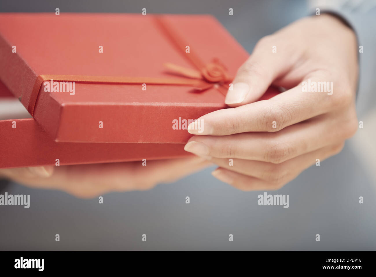 Human hands opening box hi-res stock photography and images - Alamy