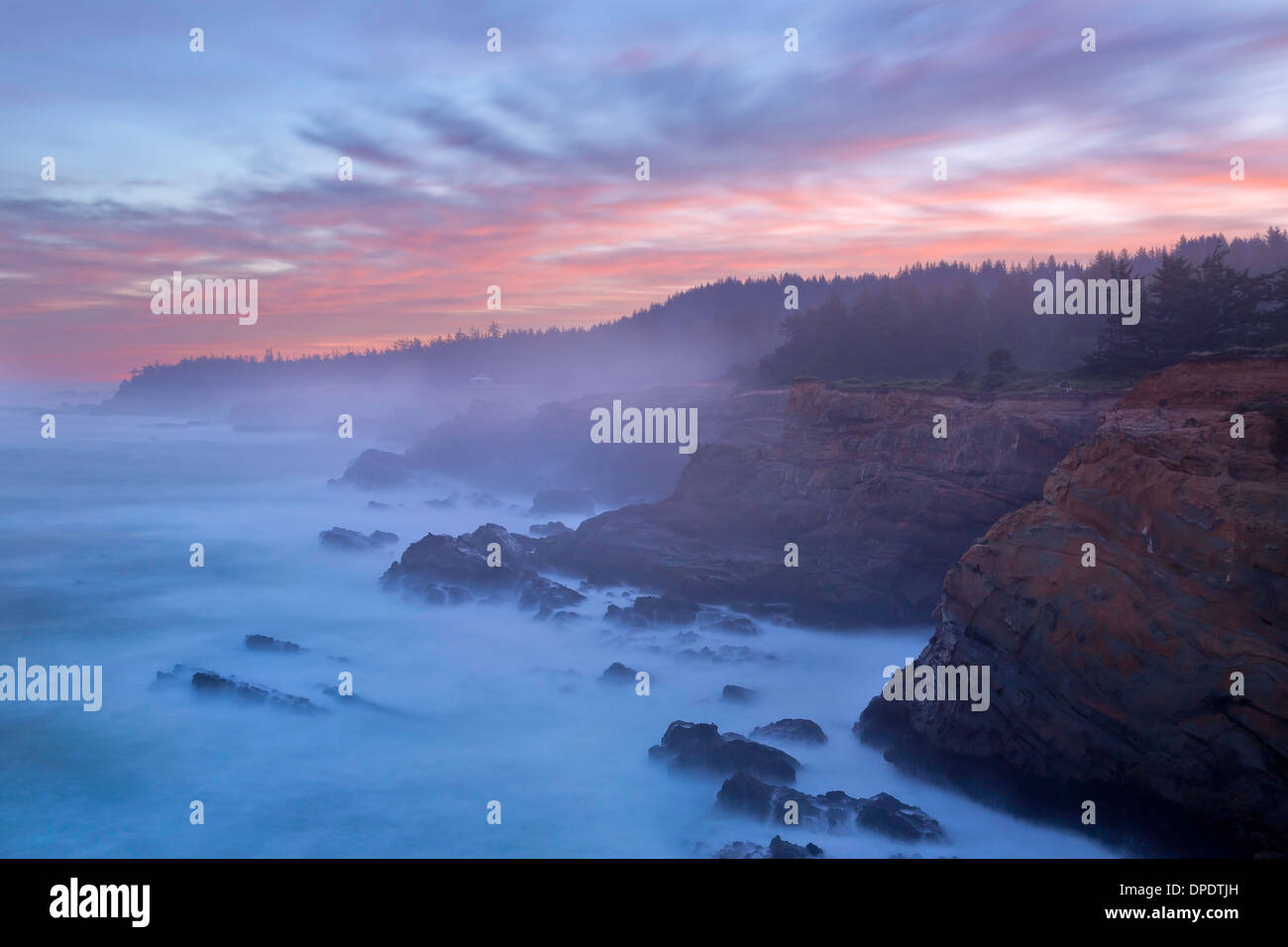 The dramatic Oregon coast line at sunrise along Shore Acres State Park ...