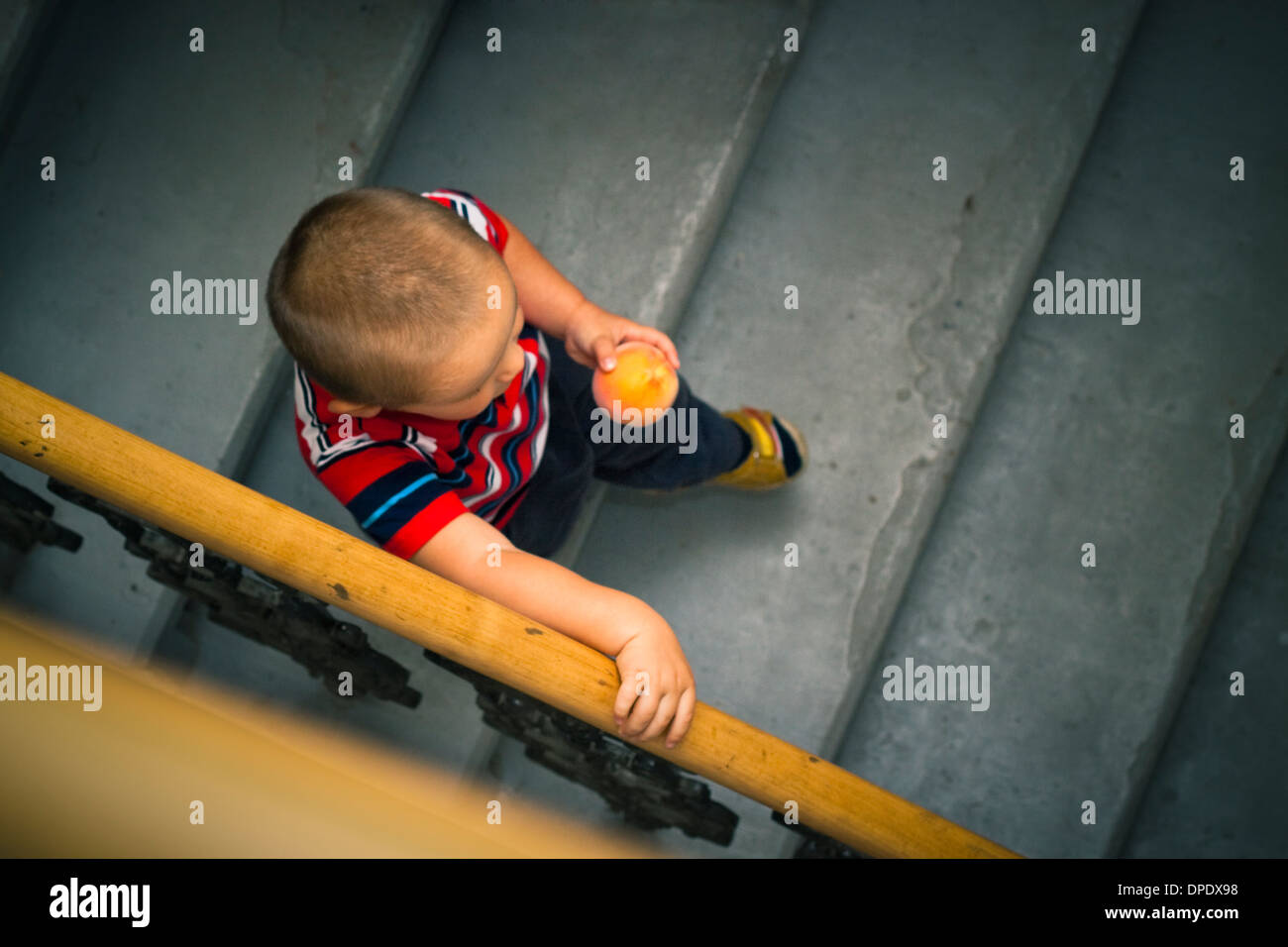 Boy Walking Down Stairs Stock Photos & Boy Walking Down Stairs Stock ...