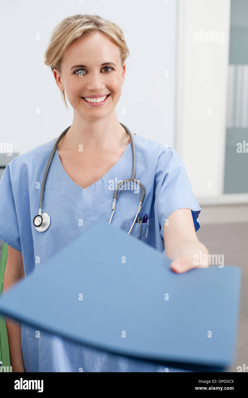 Adult handing over hi-res stock photography and images - Alamy