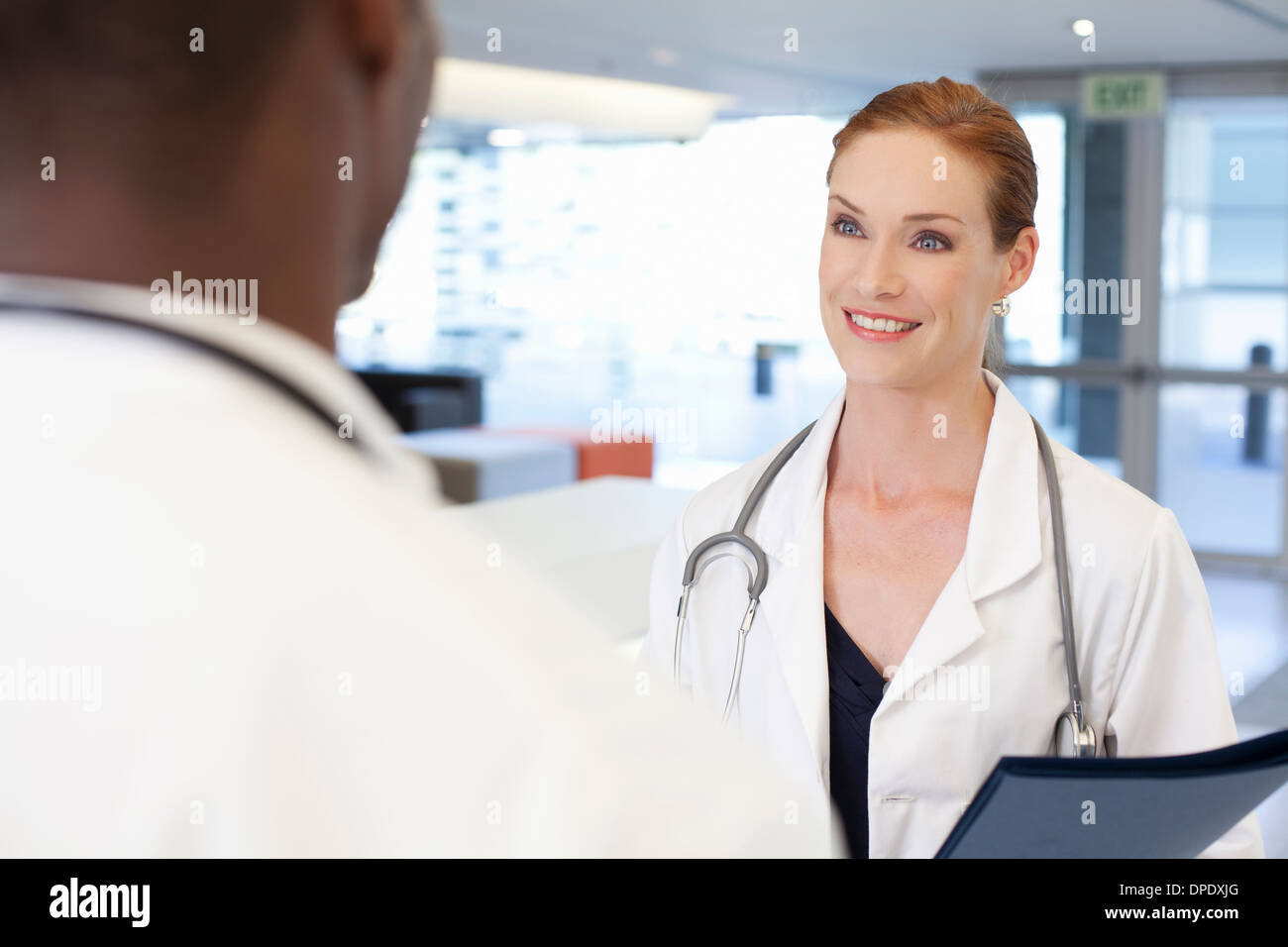 Doctors having conversation Stock Photo - Alamy