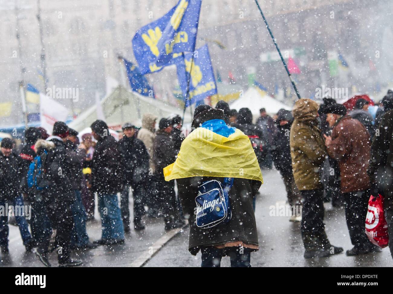 Kiev, Ukraine. 13th Jan, 2014. Protesters from Euromaidan face the ...