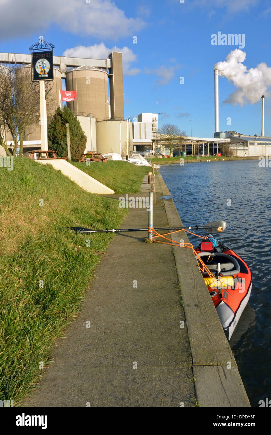 Inflatable kayak moored at the Reedcutter Inn beside the River Yare at ...