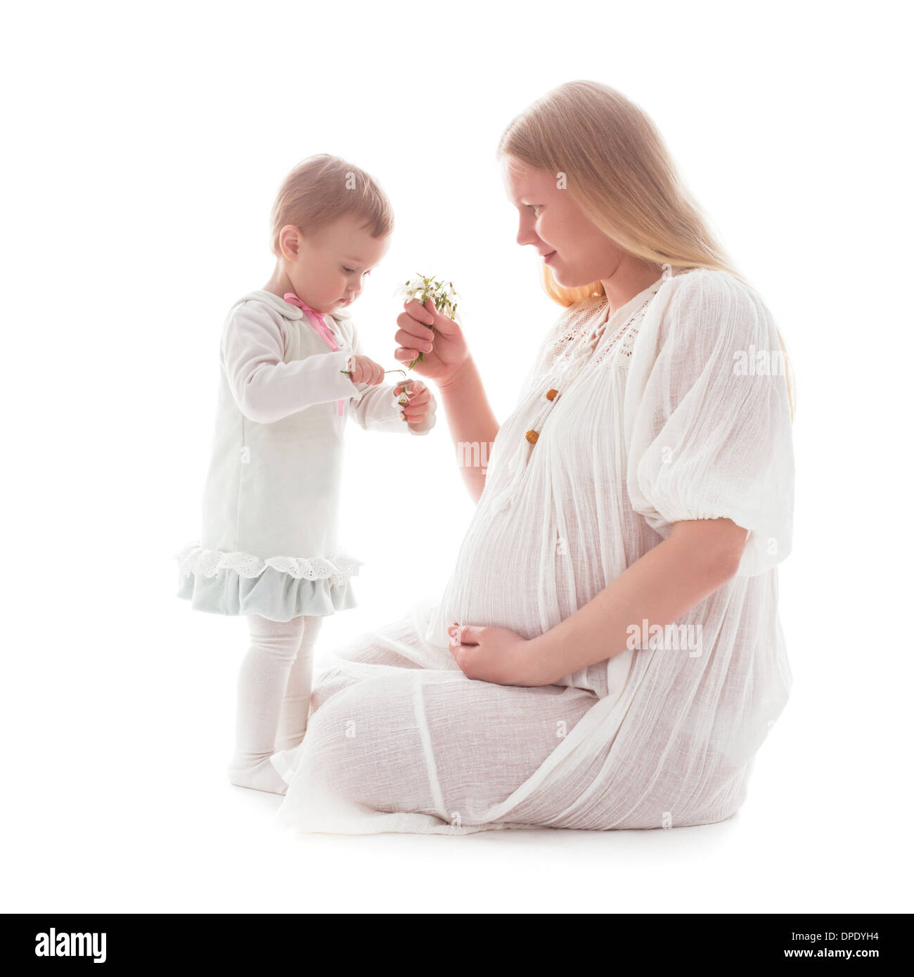 Pregnant daughter with mother happy Cut Out Stock Images & Pictures - Alamy