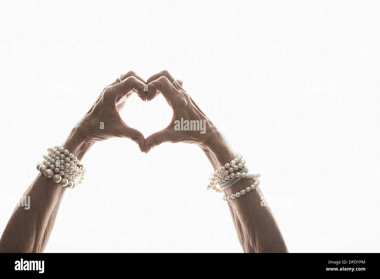 Hands making heart shape hi-res stock photography and images - Alamy