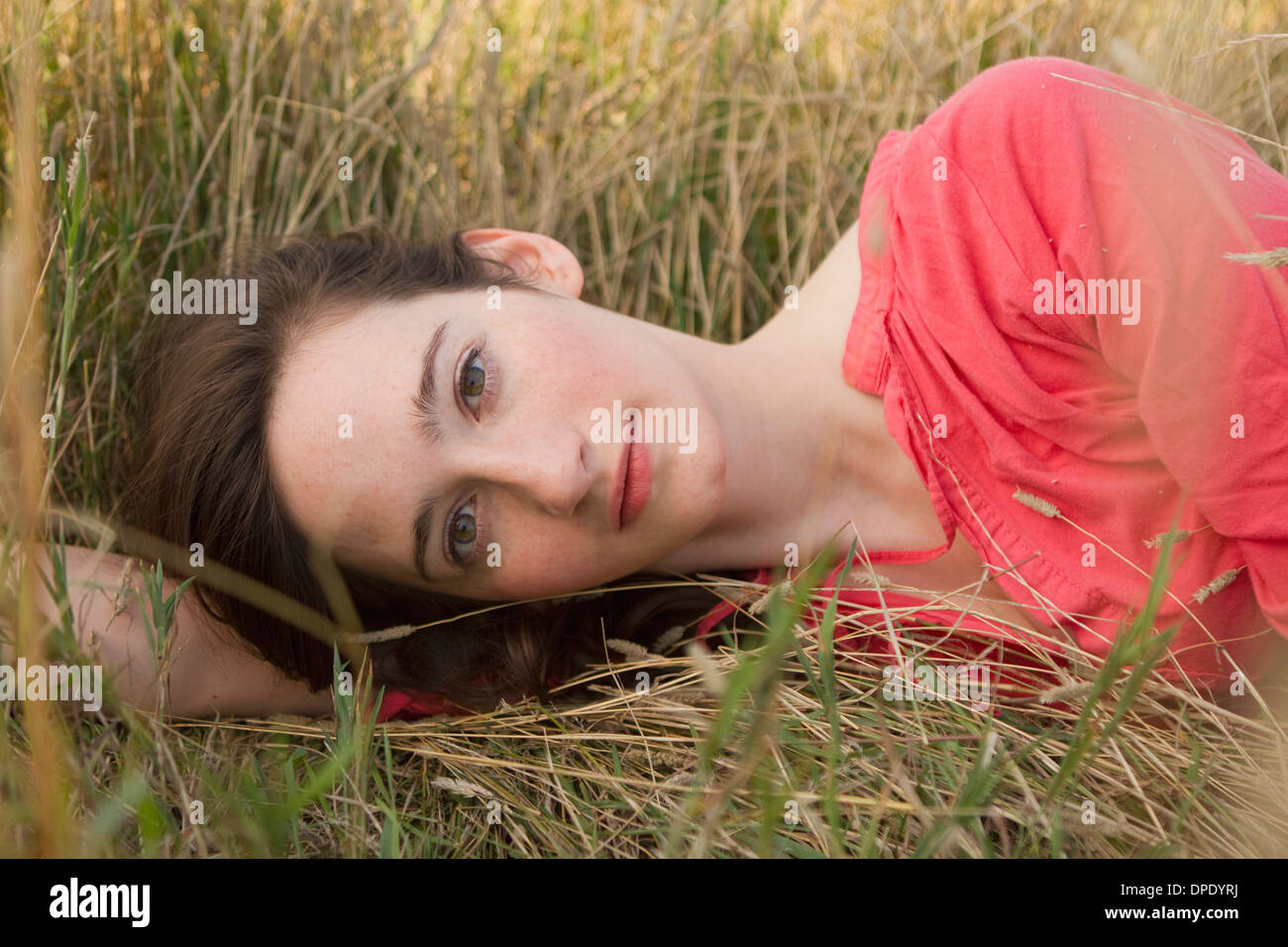 Woman lying on her side hi-res stock photography and images - Alamy