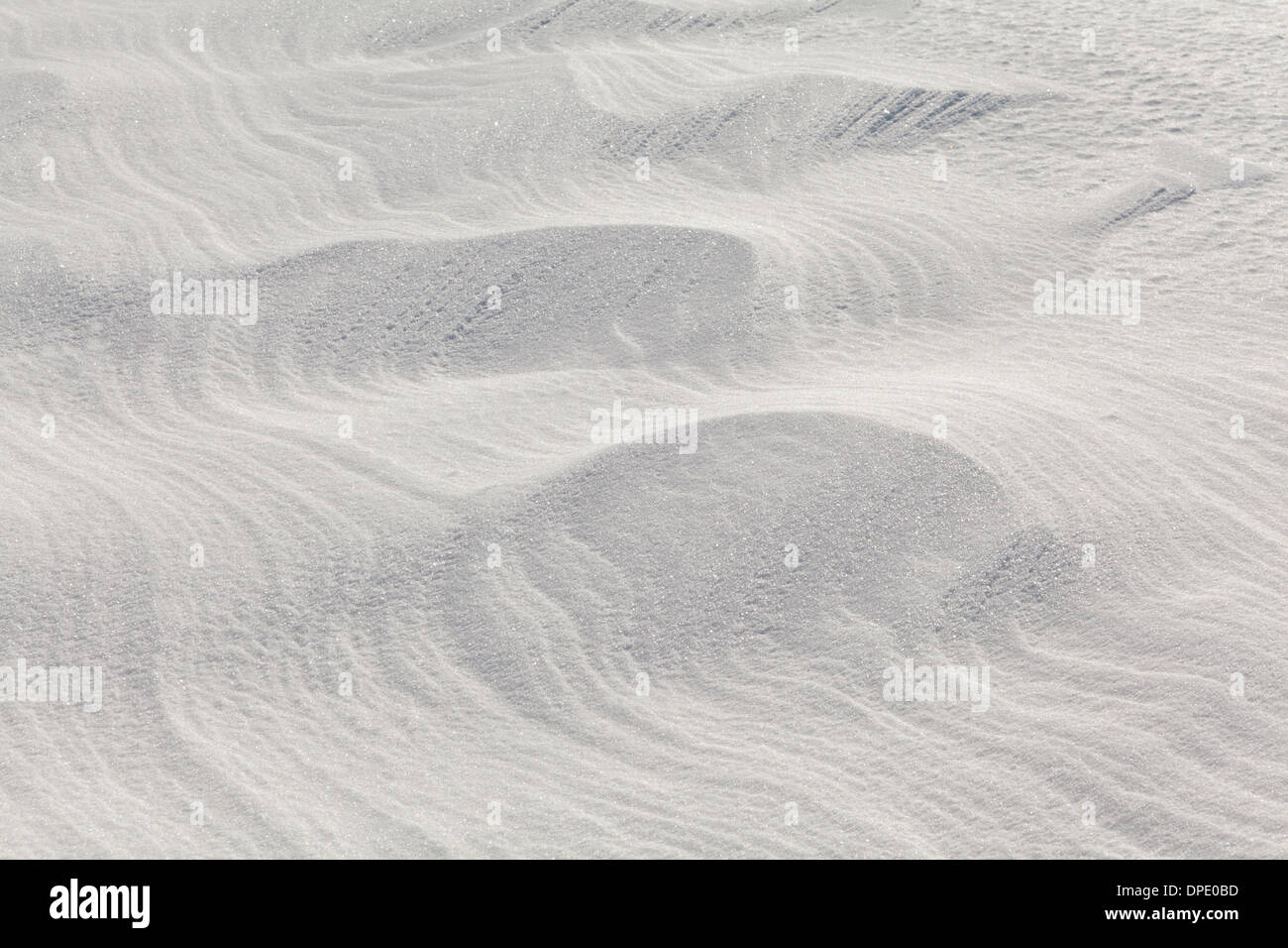 Snow patterns shaped by winds Stock Photo - Alamy
