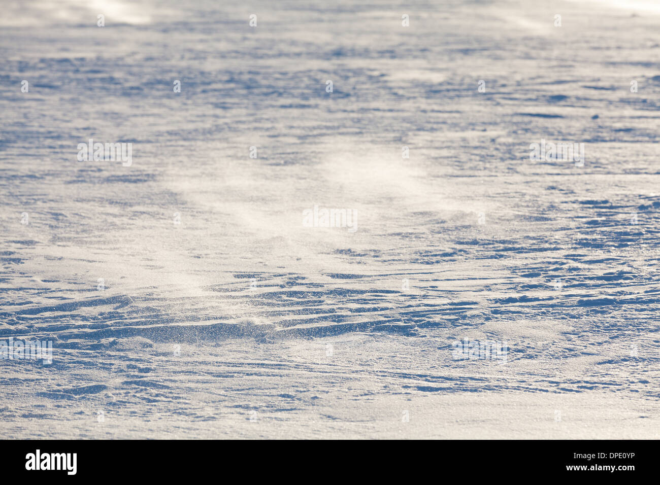 Snow patterns shaped by winds Stock Photo - Alamy