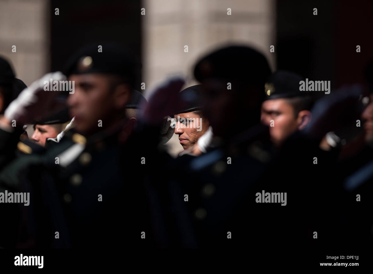 Mexico City, Mexico. 13th Jan, 2014. Honor guards perform salutes ...