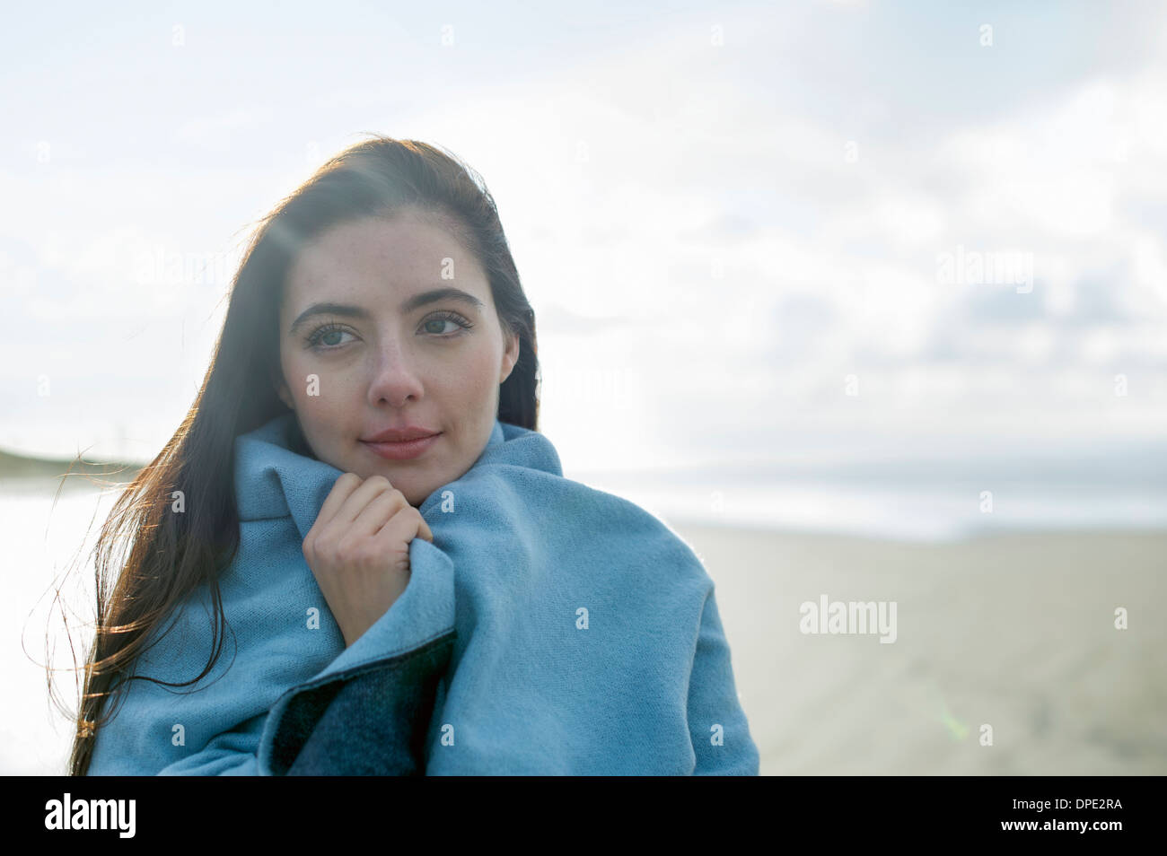 Woman in blanket hi-res stock photography and images - Alamy