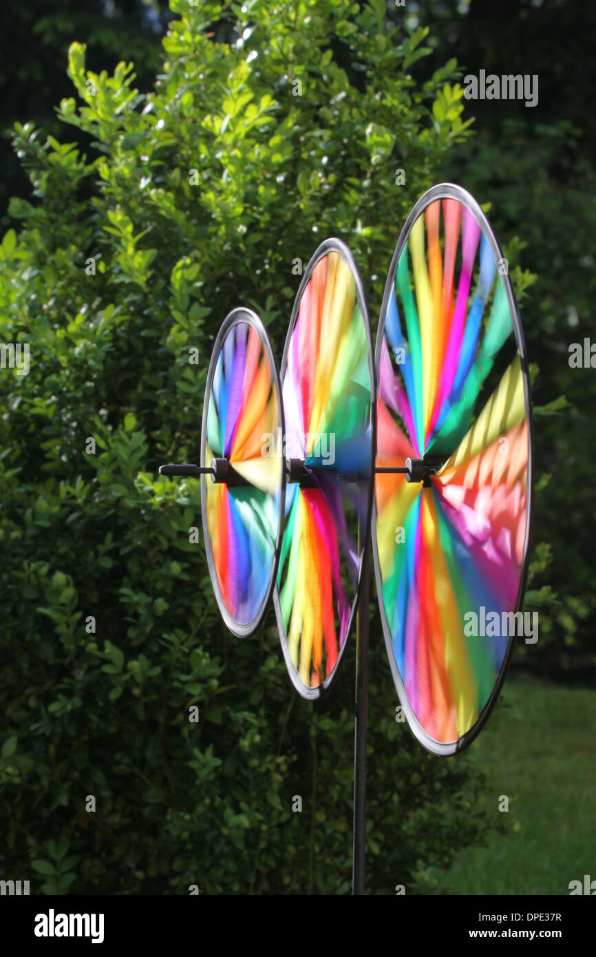 Colorful wind wheel in garden Stock Photo - Alamy
