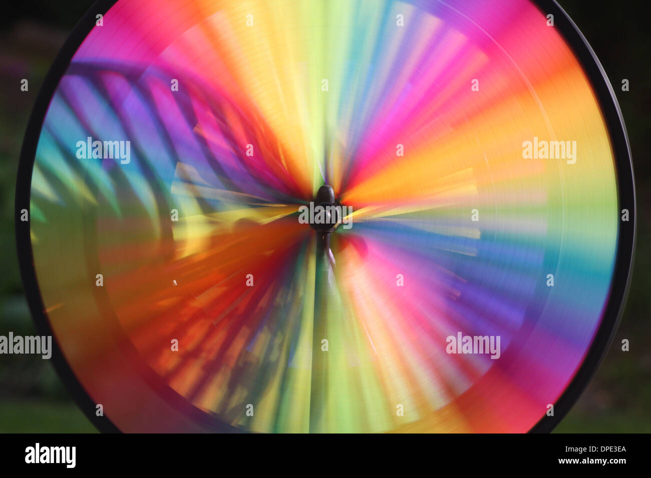 Colorful wind wheel in garden Stock Photo - Alamy