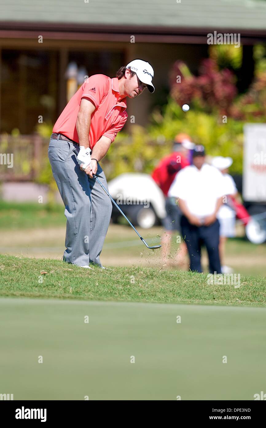 Honolulu, HI, USA. 12th Jan, 2014. Brian Harmon chips on the 18th green ...