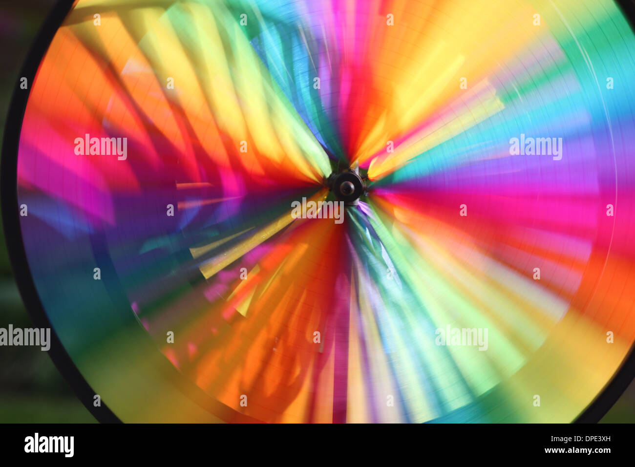 Colorful wind wheel in garden Stock Photo - Alamy