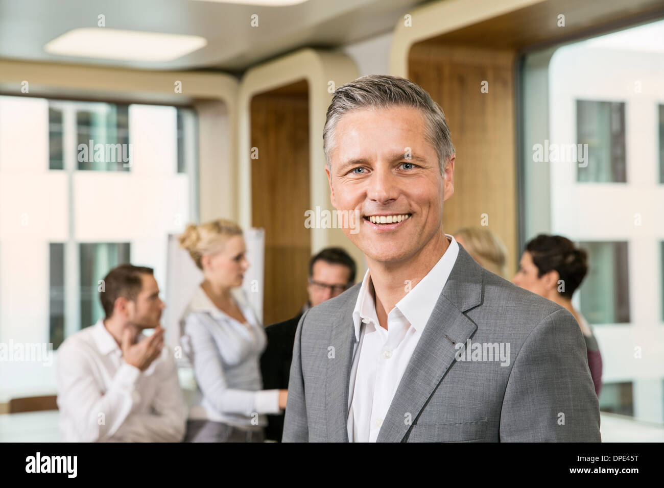 Man standing in front building hi-res stock photography and images - Alamy
