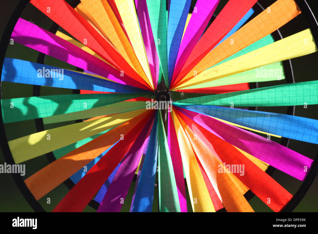 Colorful wind wheel in garden Stock Photo - Alamy