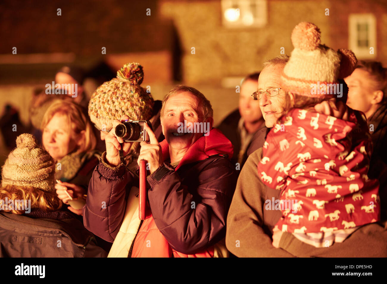 People watch a 60 foot scale model of a HS2 train burning during a ...