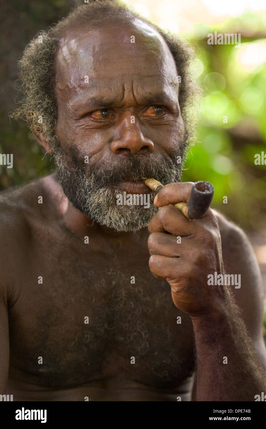 Vanuatuan man smoking a local pipe, Yakel Kastom (traditional culture ...