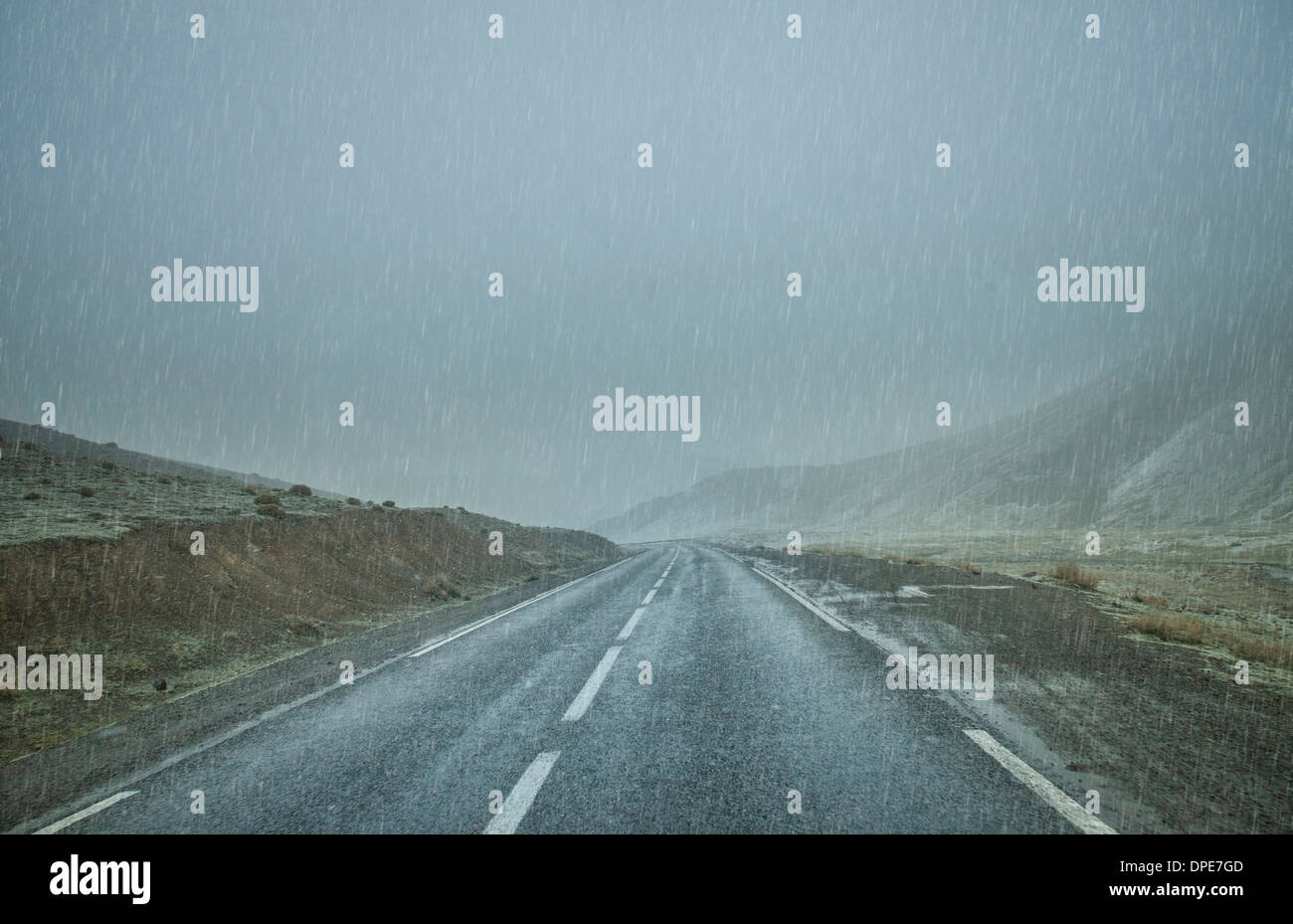 Road in rain, Atlas Mountains, Morocco Stock Photo - Alamy
