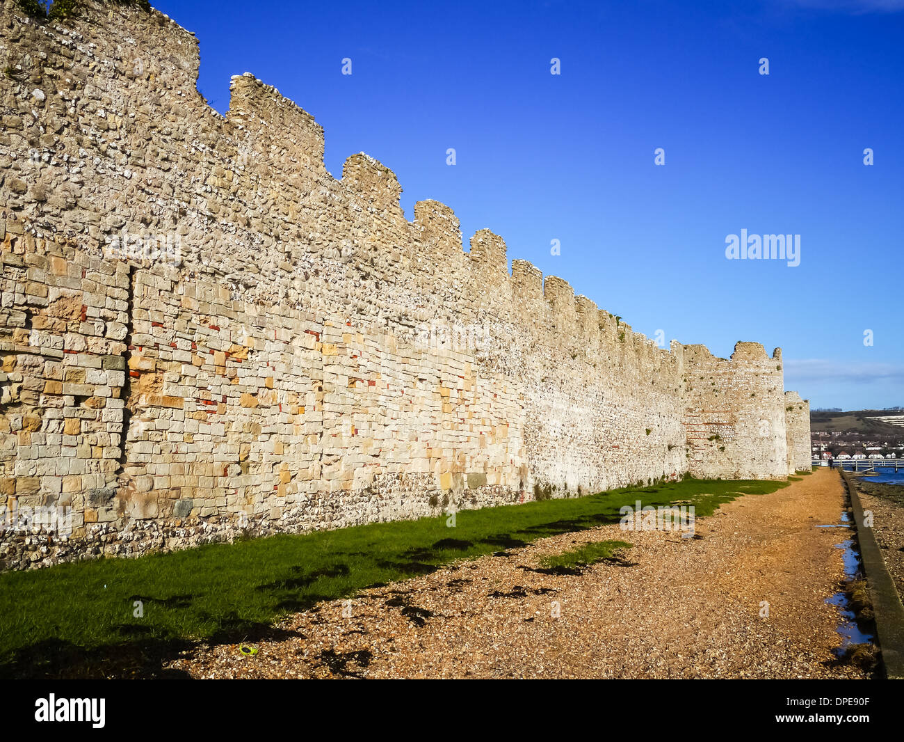The external sea facing Roman walls of Portchester Castle Stock Photo ...