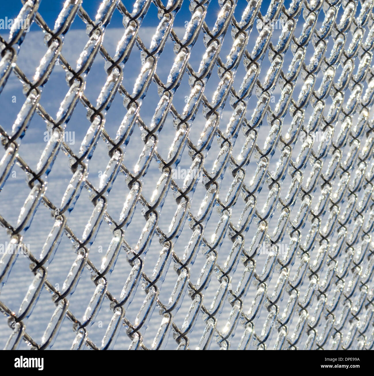 Ice coated chain link fence from an ice storm Stock Photo - Alamy