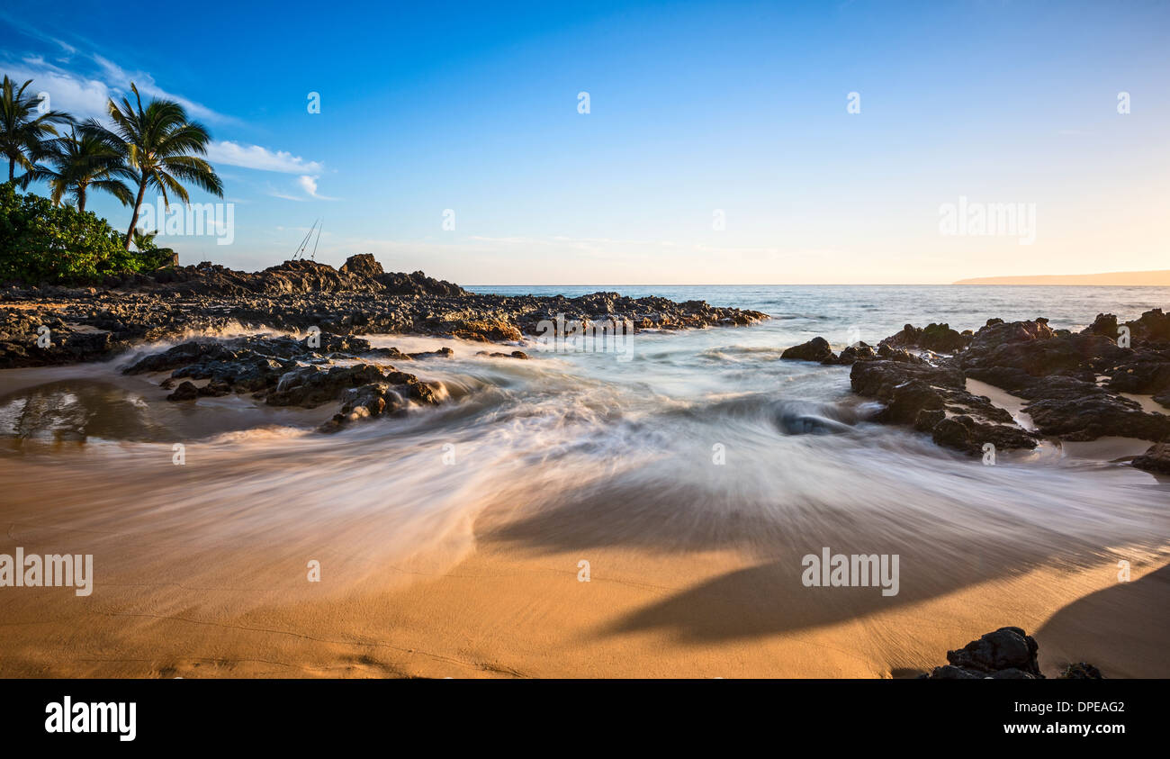 Beautiful and secluded Secret Beach in Maui, Hawaii Stock Photo - Alamy
