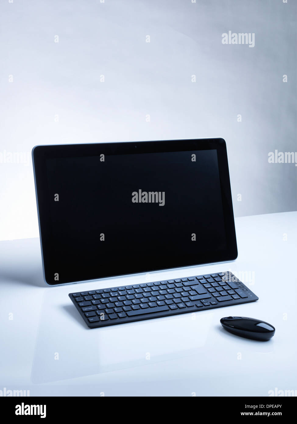 Computer on desk Stock Photo - Alamy