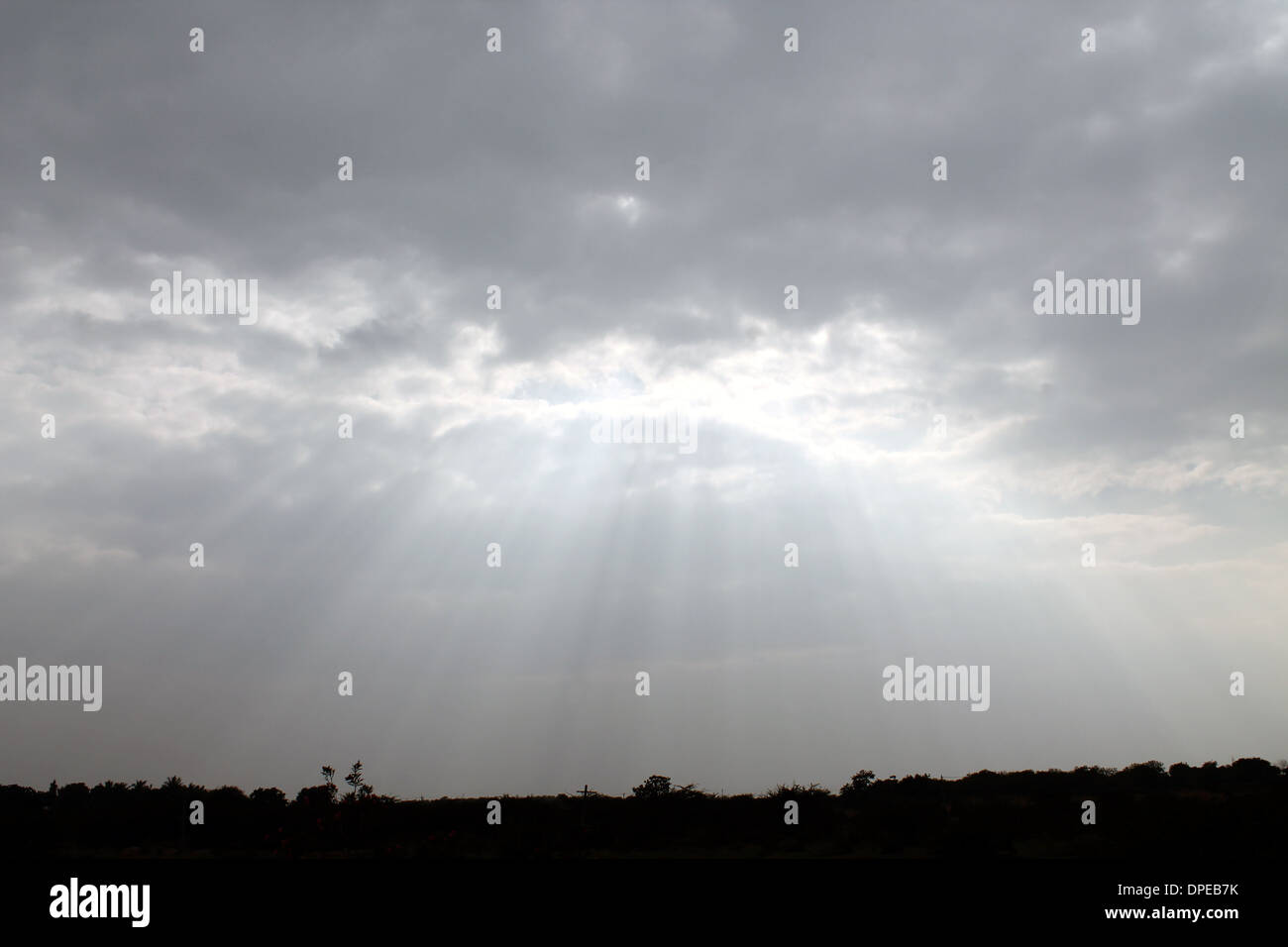 Sun Coming Through Clouds High Resolution Stock Photography and Images ...