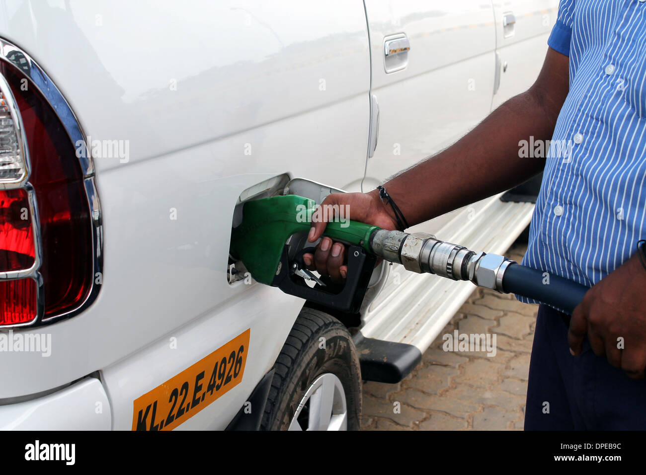 Filling fuel to motor car Stock Photo - Alamy