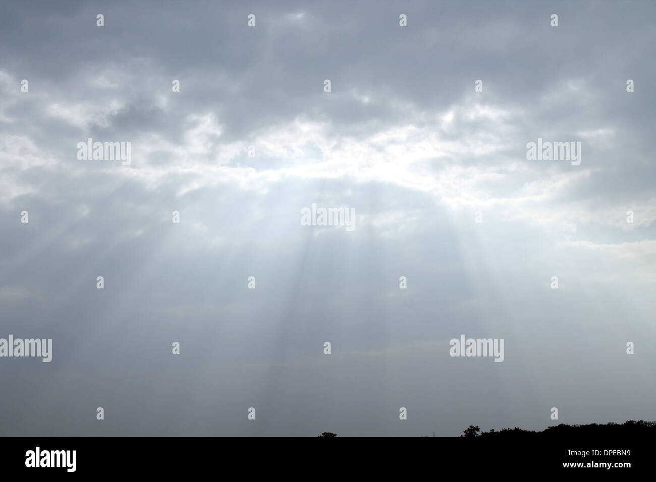 Sun Coming Through Clouds High Resolution Stock Photography and Images ...