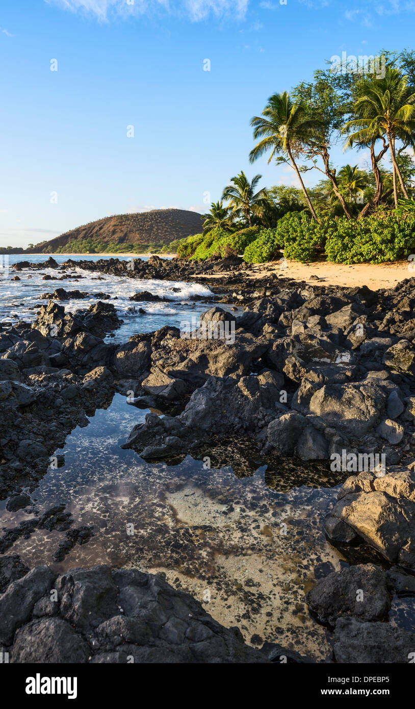 An unamed cove with a small strip of perfectly sandy beach Stock Photo ...