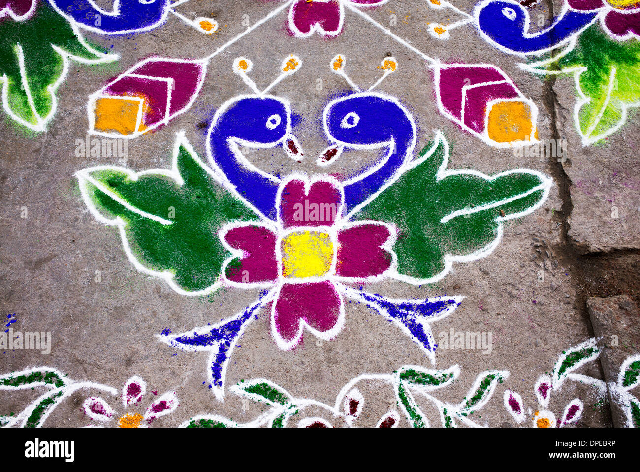 Rangoli festival coloured powder design in an Indian street Stock Photo ...