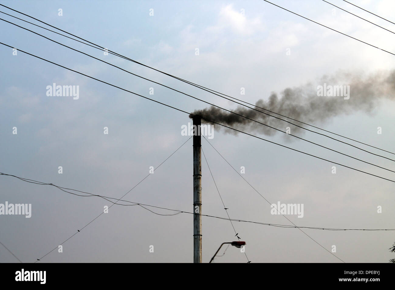 Smoke being exhausted to air from a factory Stock Photo - Alamy