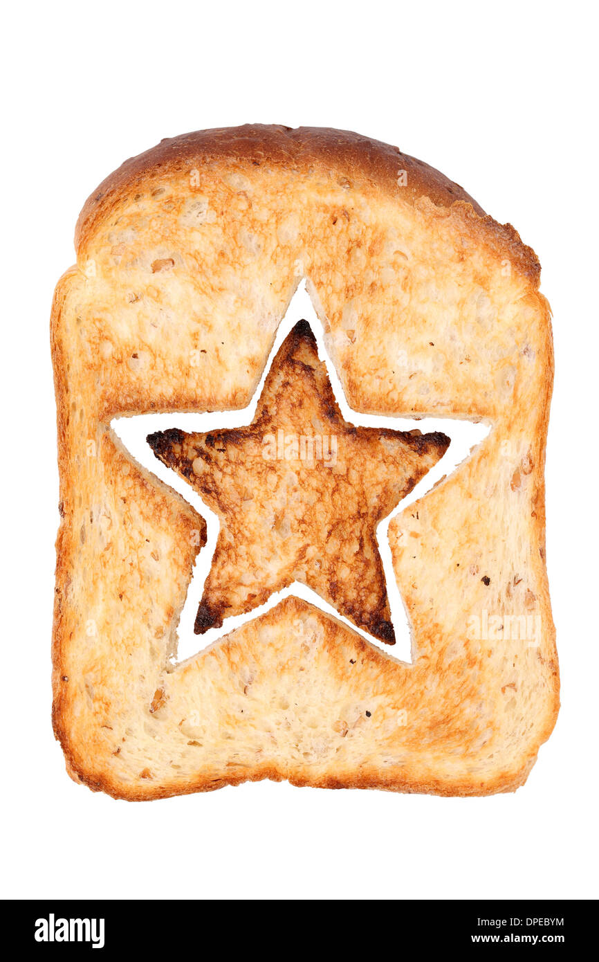 Slice of bread toast cut hole in shape of star Stock Photo - Alamy