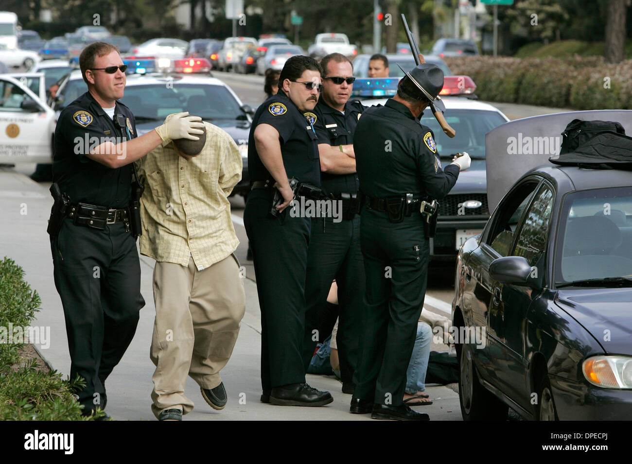 Man under arrest hi-res stock photography and images - Alamy