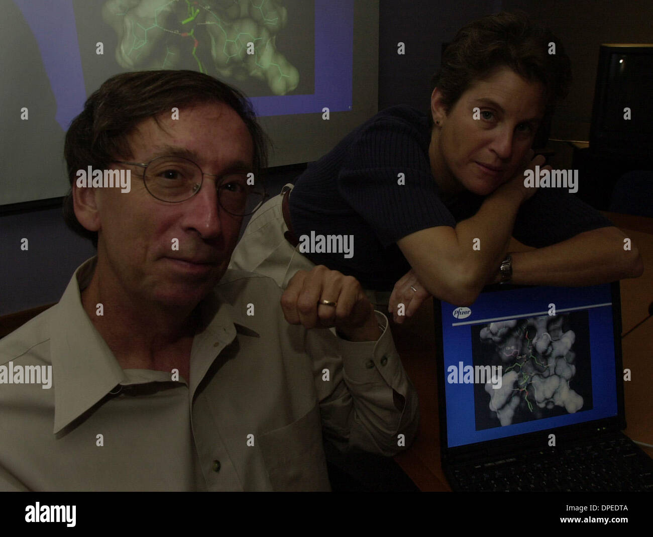 (published 08/10/2003, H-1) Dave Matthews and Amy Patick of Pfizer ...