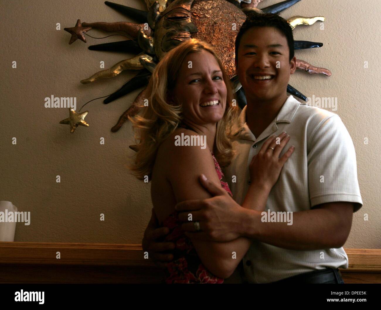 (Published cropped 4/3/2005, J-1)Cristy Birkle and Gary Lum were ...