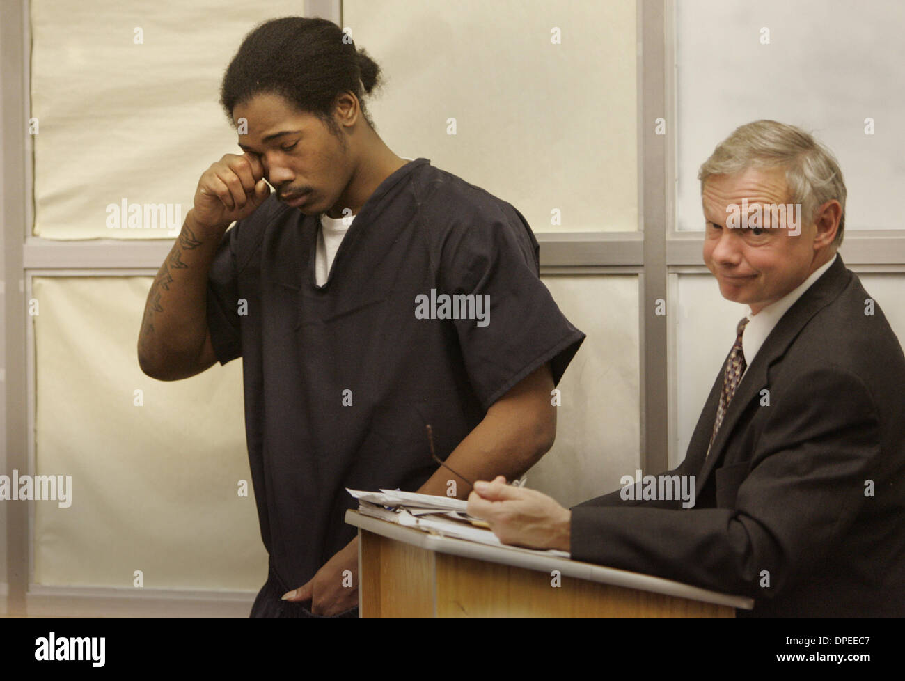 (Published 6/1/2005, B-4) Kenny Wayne Alfred Jr. wiped his eyes during ...