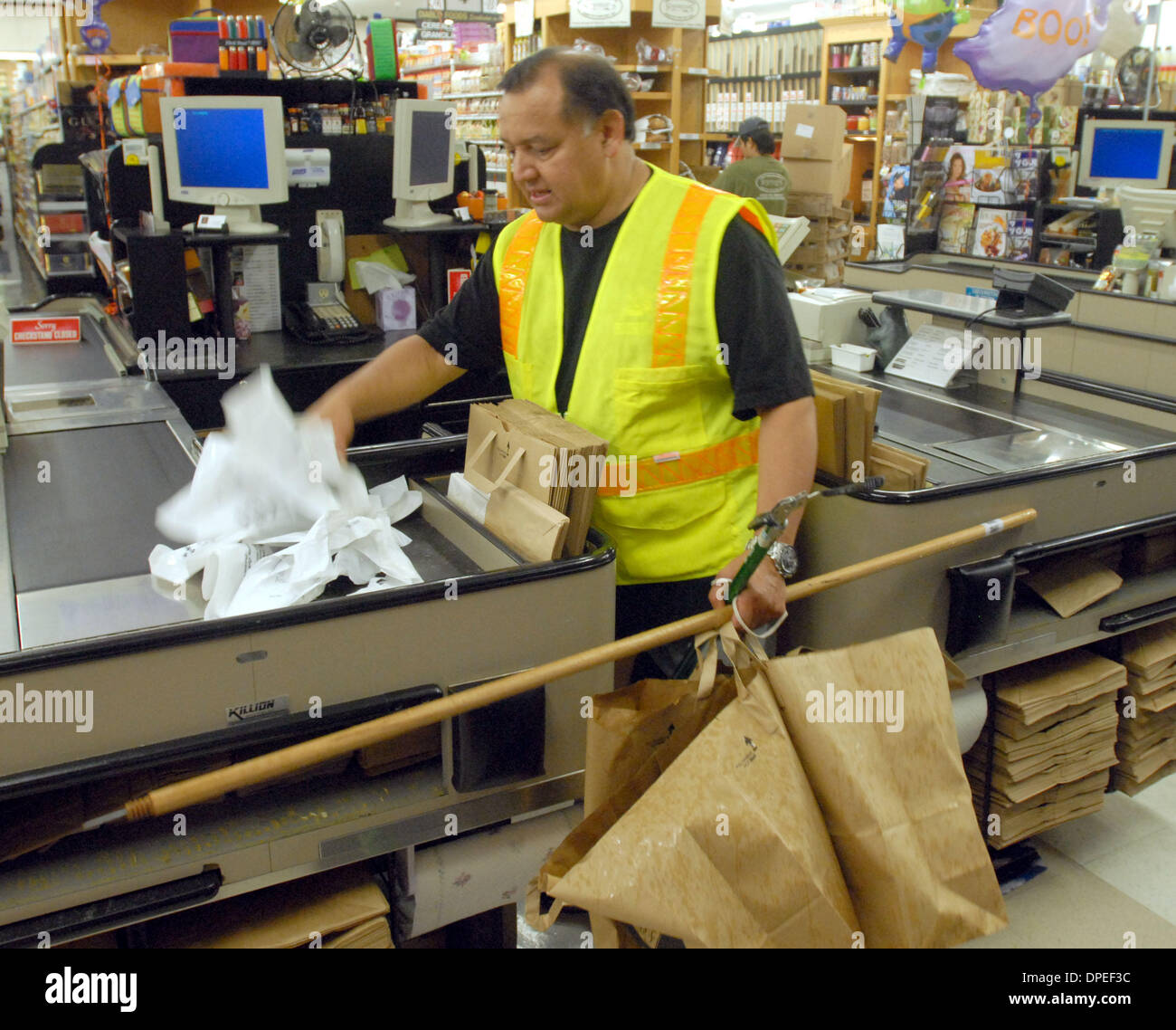 Trash collector John Quezada makes a stop at Diablo Foods in Lafayette to get some dry bags to ...