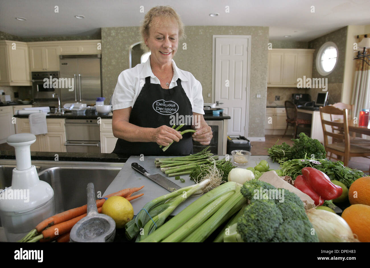 (Published 7/31/2005, N-4) Personal chef JONI WILHELM breaks asparagus ...