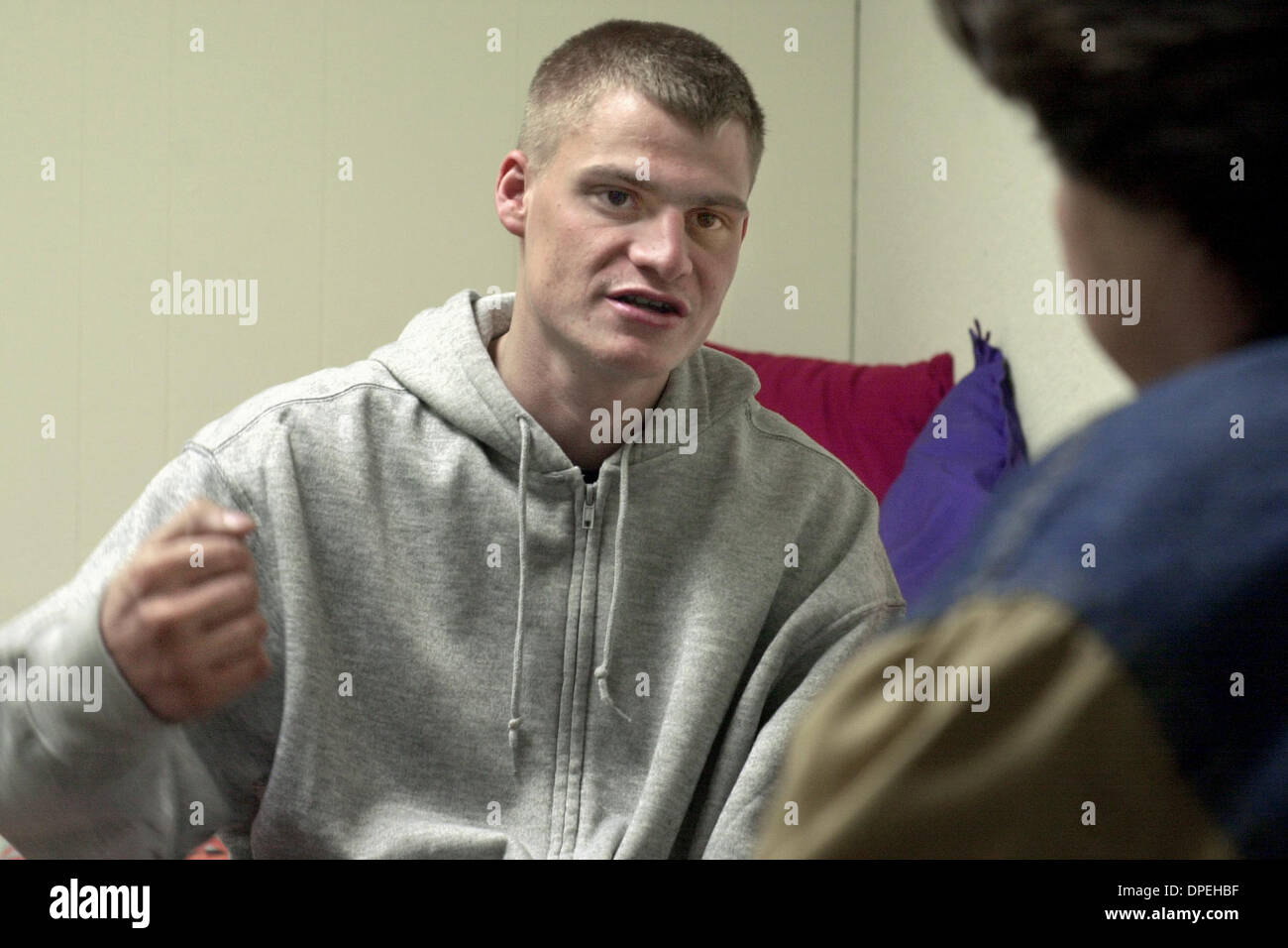 (PUBLISHED 04/13/2003, NC-3): Homeless teenager KYLE MOORE speaks to ...