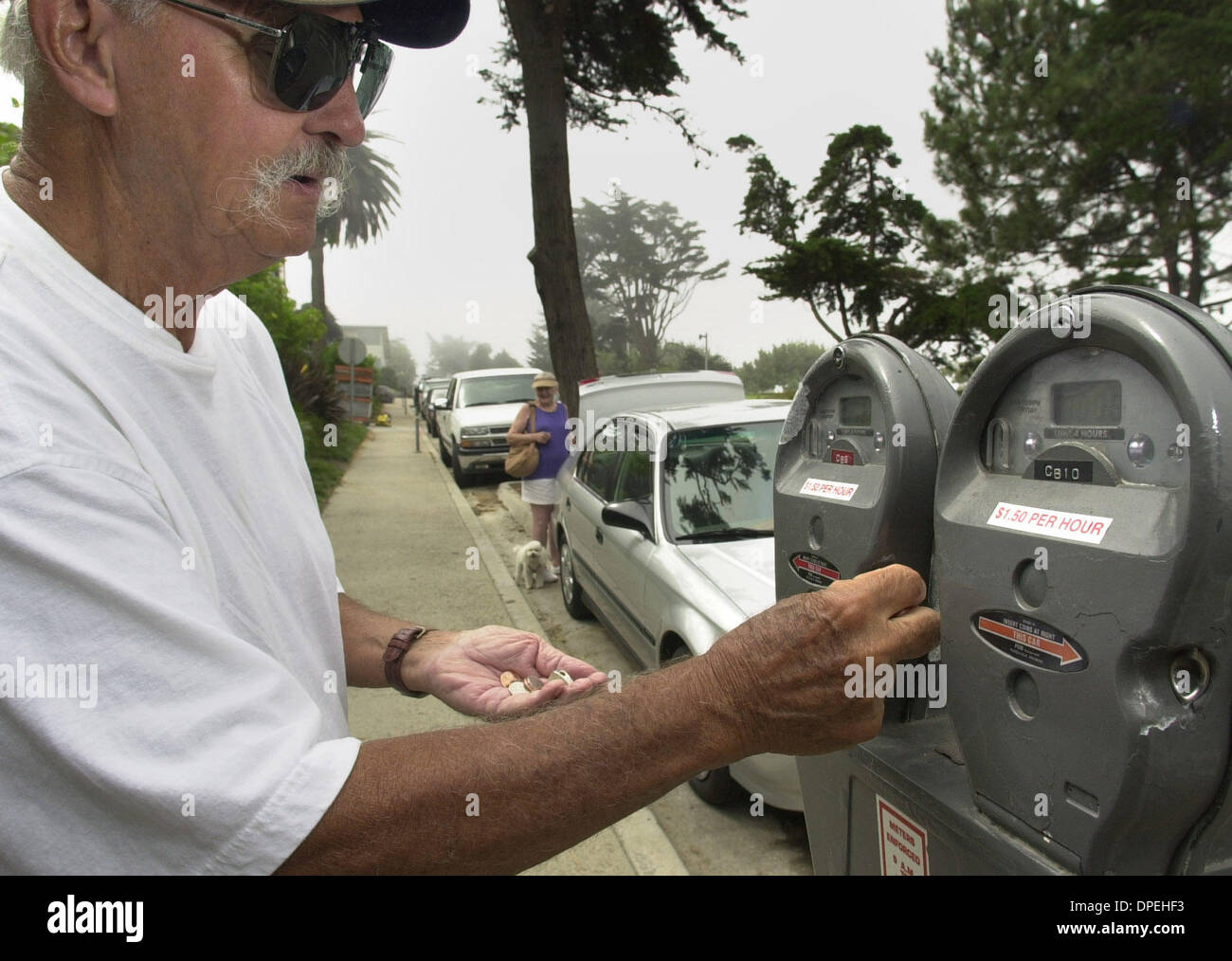 (published 07/26/2003, NC-1) Bob Landry of Palm Springs puts change in ...