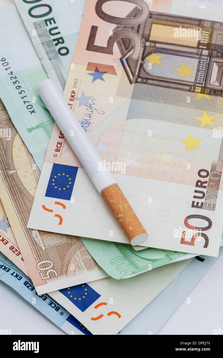 Money and cigarette hi-res stock photography and images - Alamy