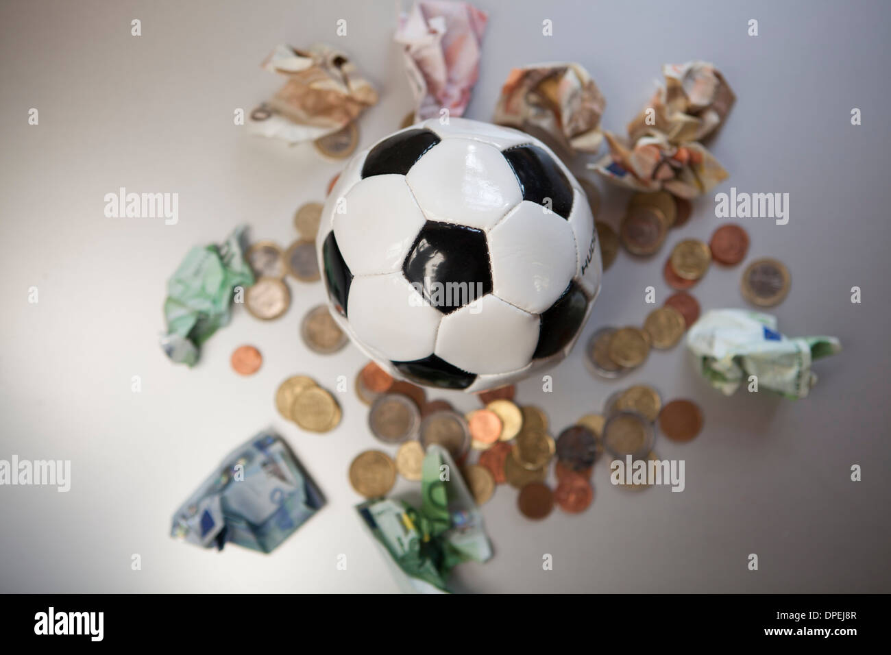 soccer ball and money Stock Photo - Alamy
