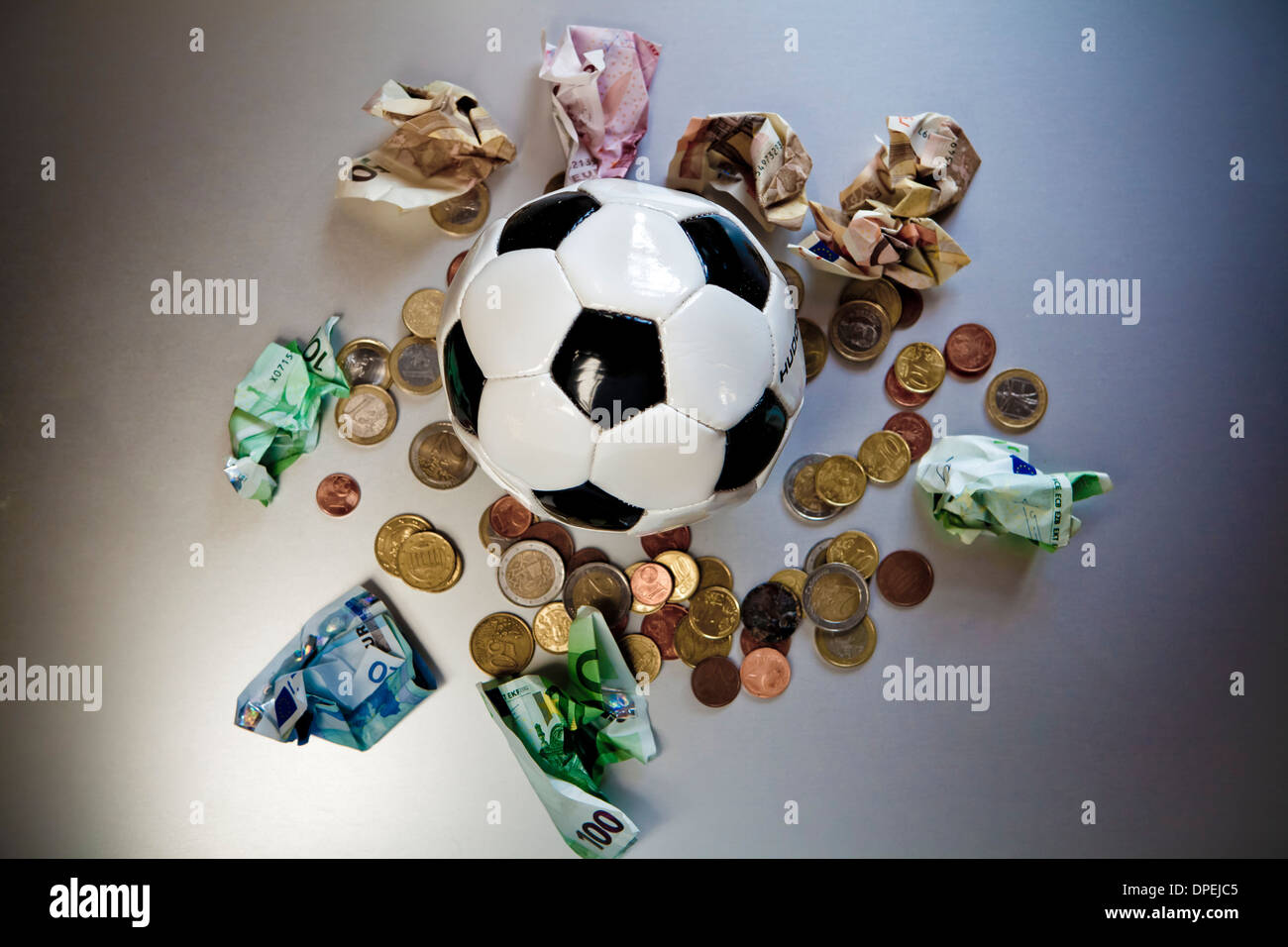 money and soccer ball Stock Photo - Alamy